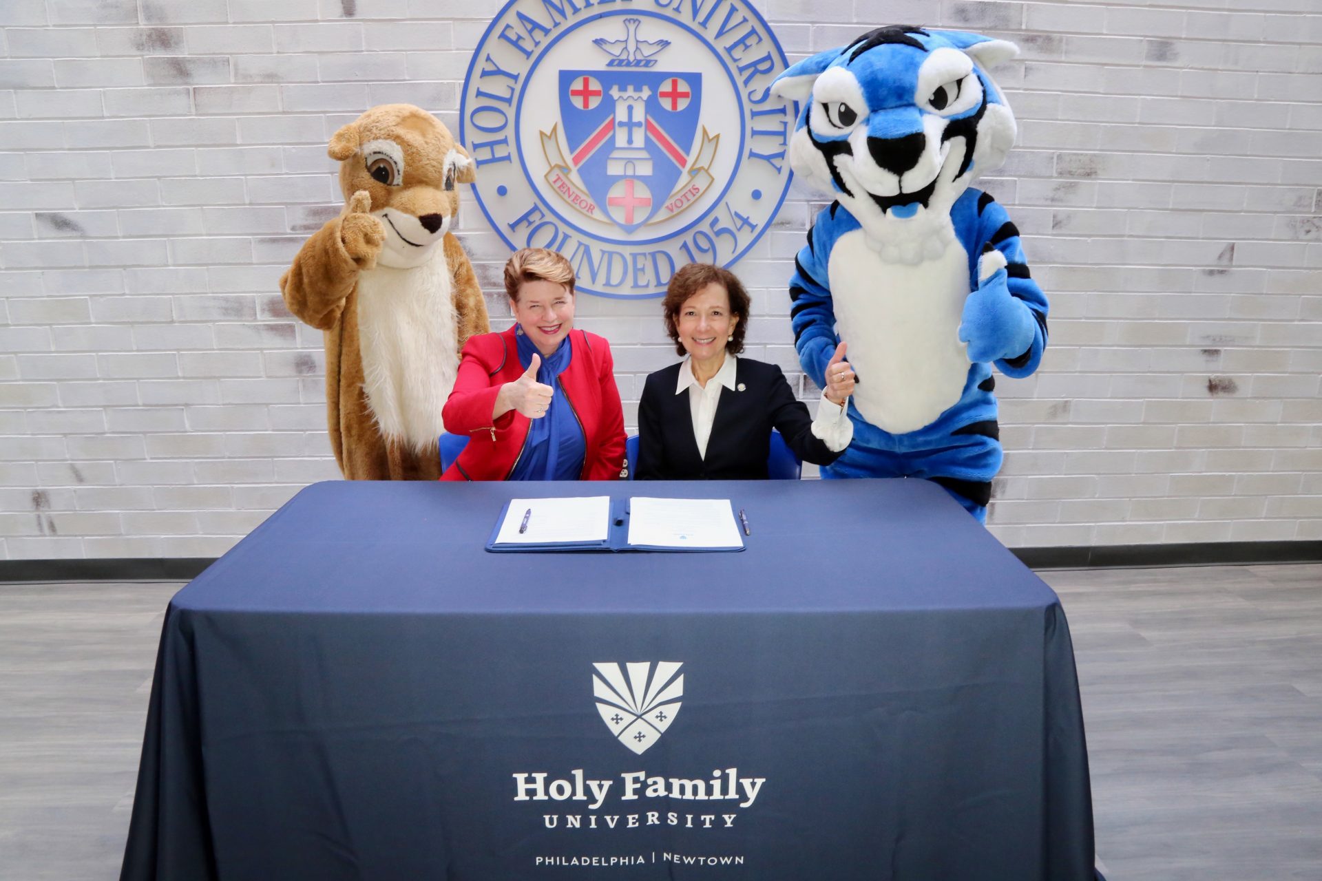 St. Hubert, Holy Family sign agreement - Northeast Times